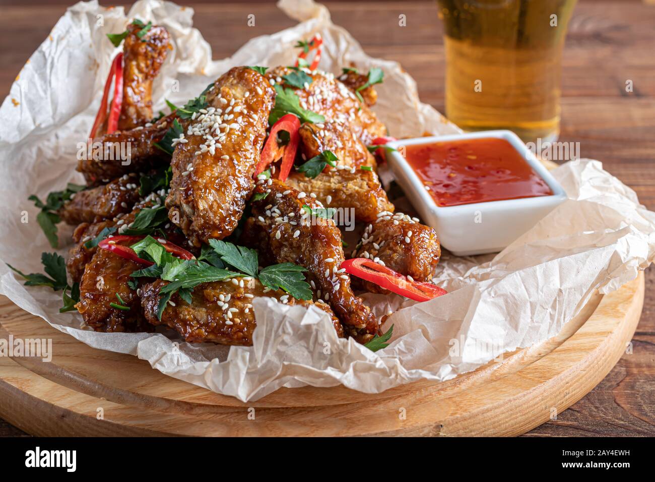 Chicken wings in soy sauce. Served for beer. Sprinkle with sesame seeds ...