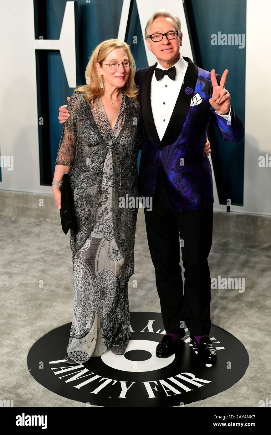 Paul Feig (right) and Laurie Feig attending the Vanity Fair Oscar Party ...