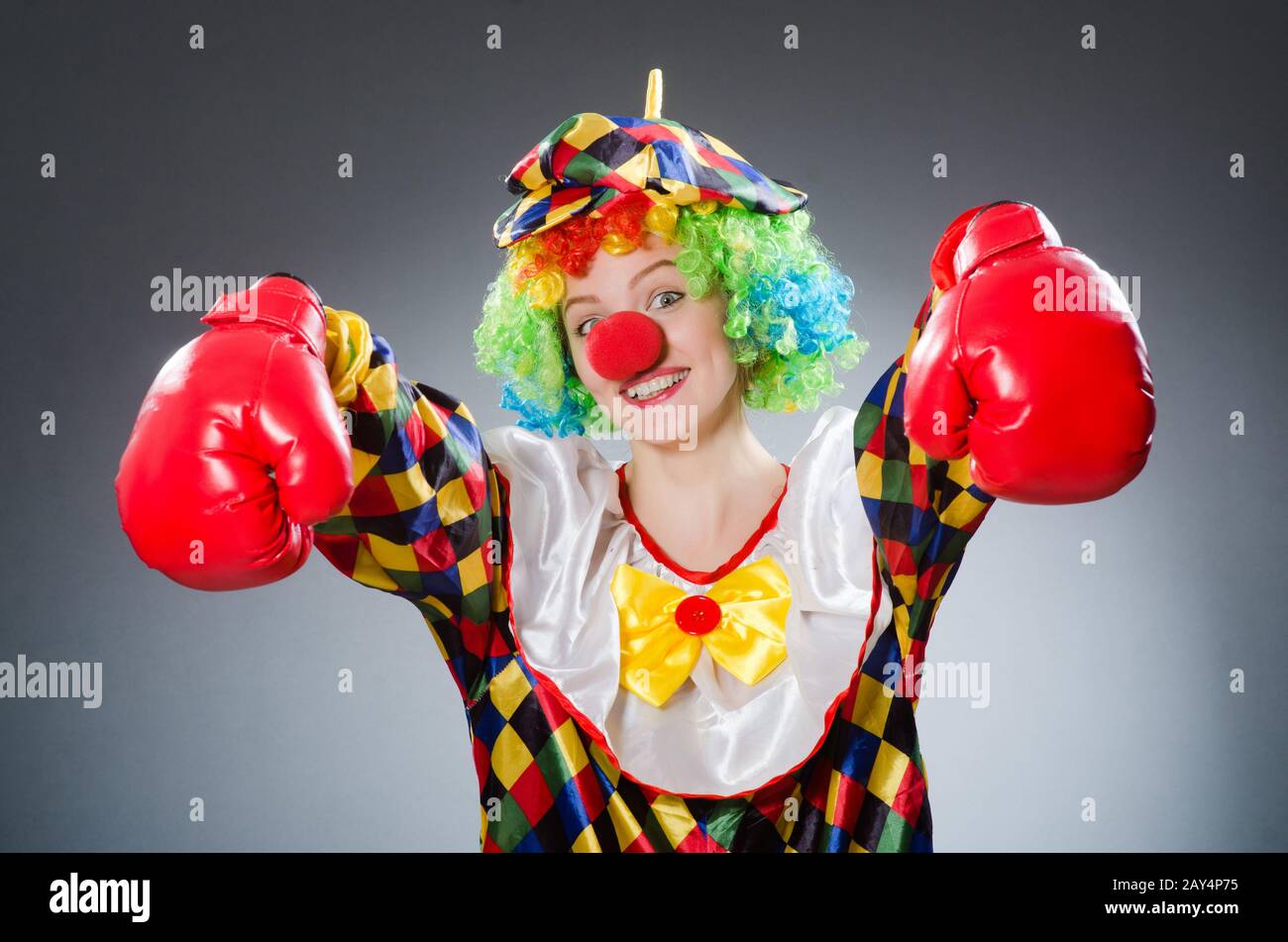 Funny clown with boxing gloves Stock Photo - Alamy