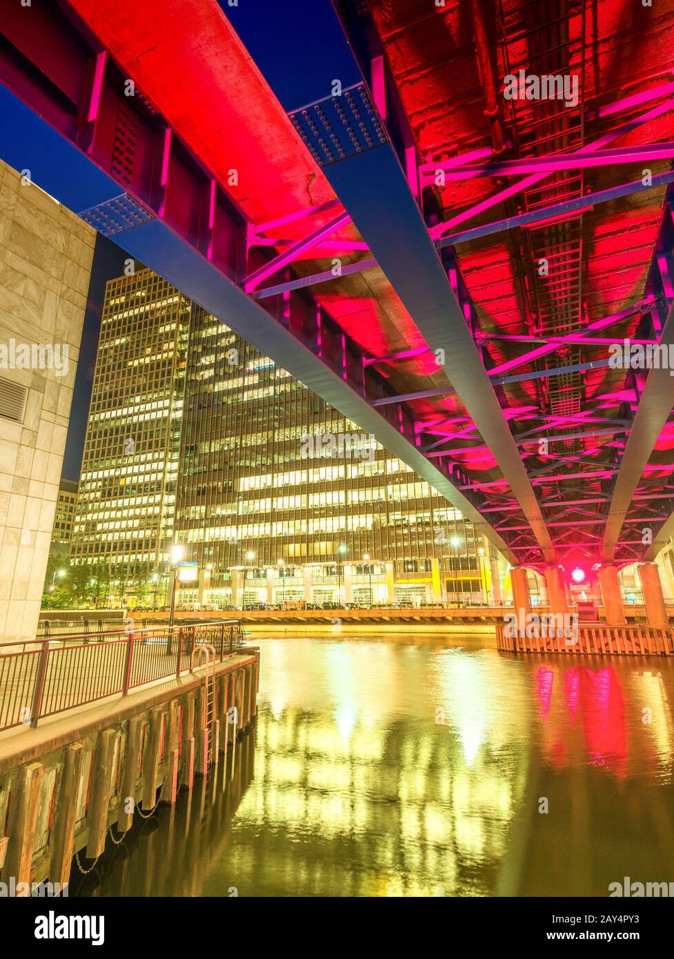 Colourful bridge at night in Canary Wharf, London Stock Photo - Alamy