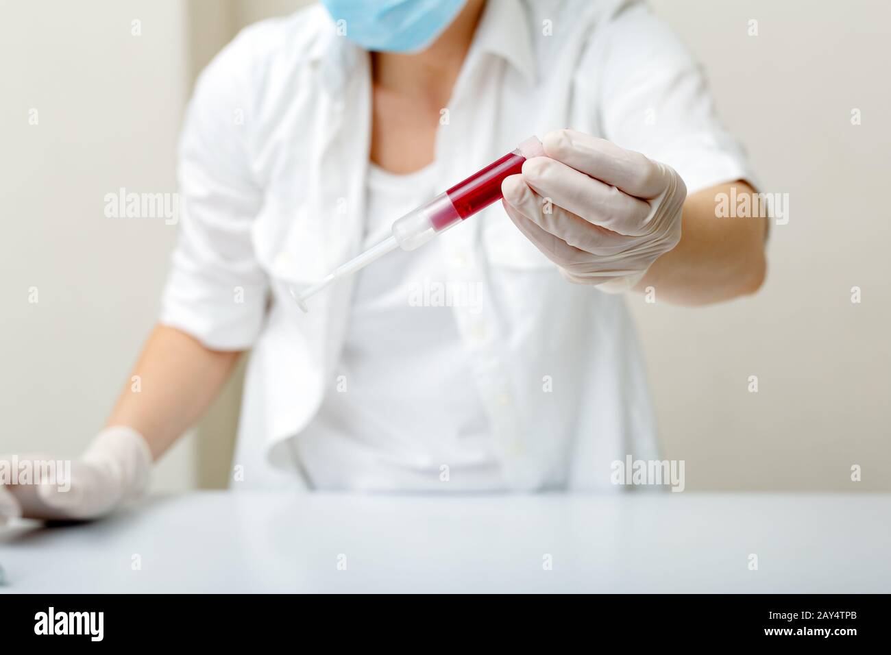 Blood test in tube for laboratory analysis in doctors hand. Laboratory ...