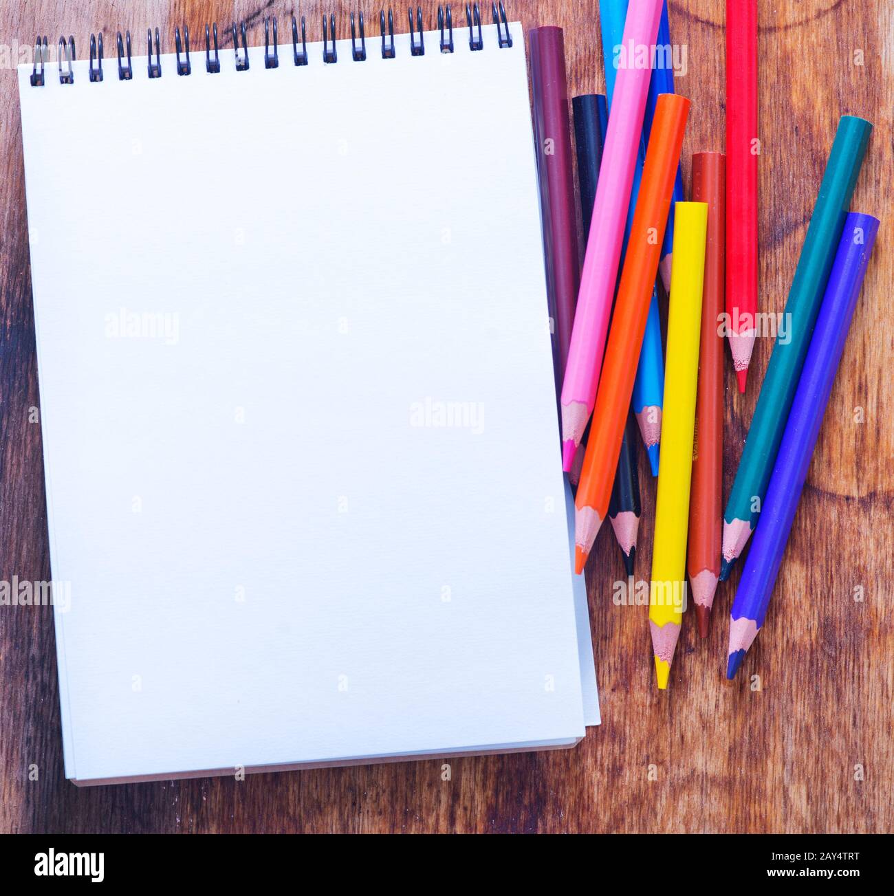 pencils and note Stock Photo - Alamy