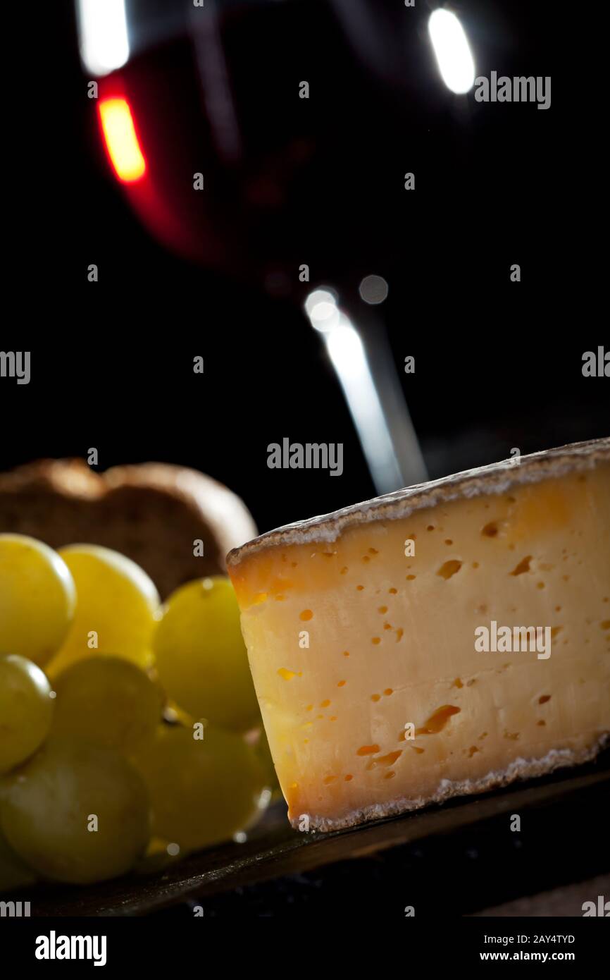 Swiss cheese and red wine Stock Photo - Alamy