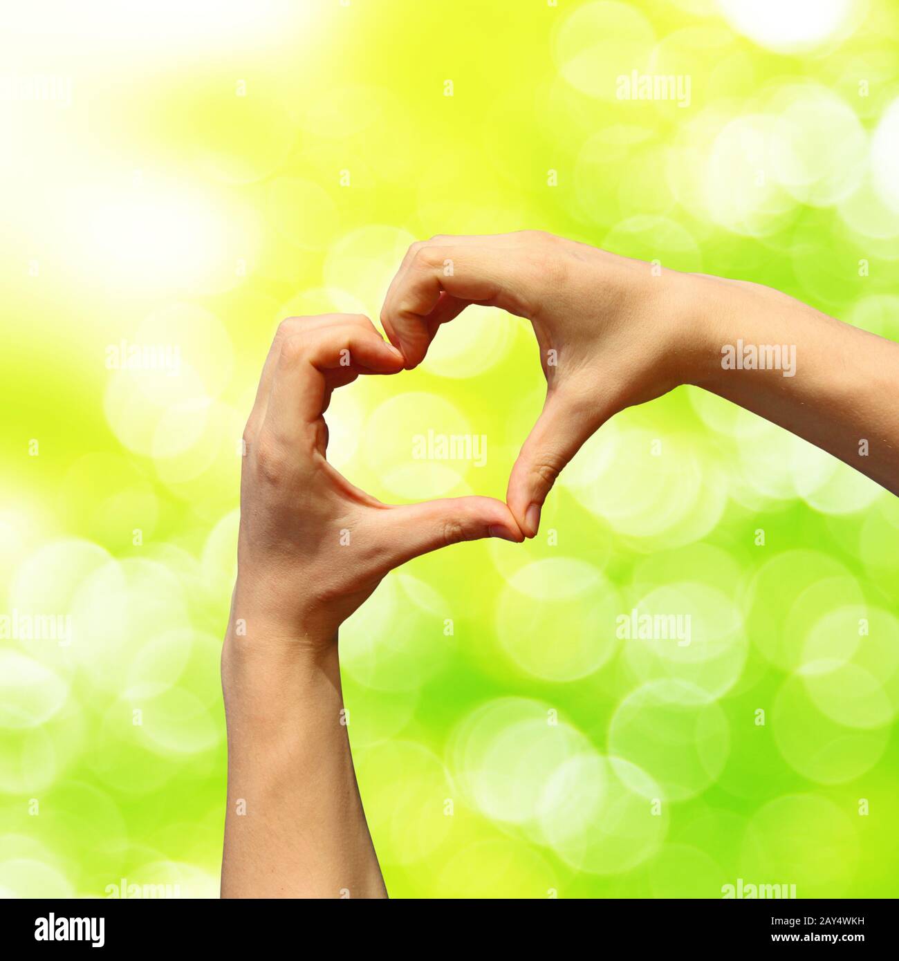 Hands in shape of love heart Stock Photo - Alamy