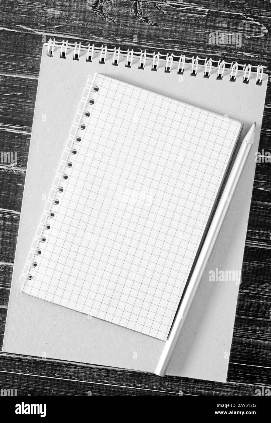 Spiral notebook pencil on Black and White Stock Photos & Images - Alamy