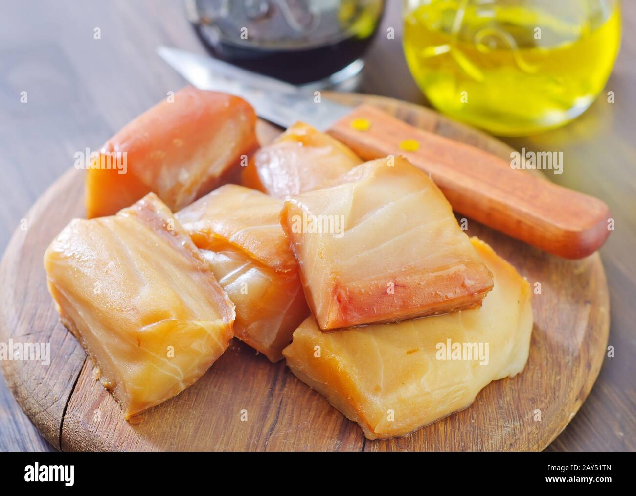 smoked fish on board Stock Photo - Alamy