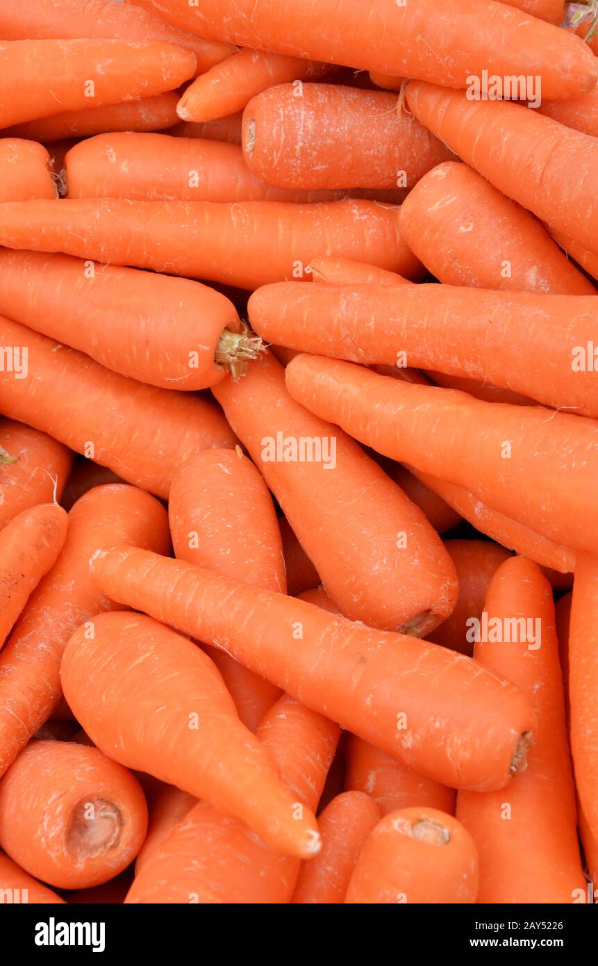 Fresh carrots at the local market Stock Photo - Alamy