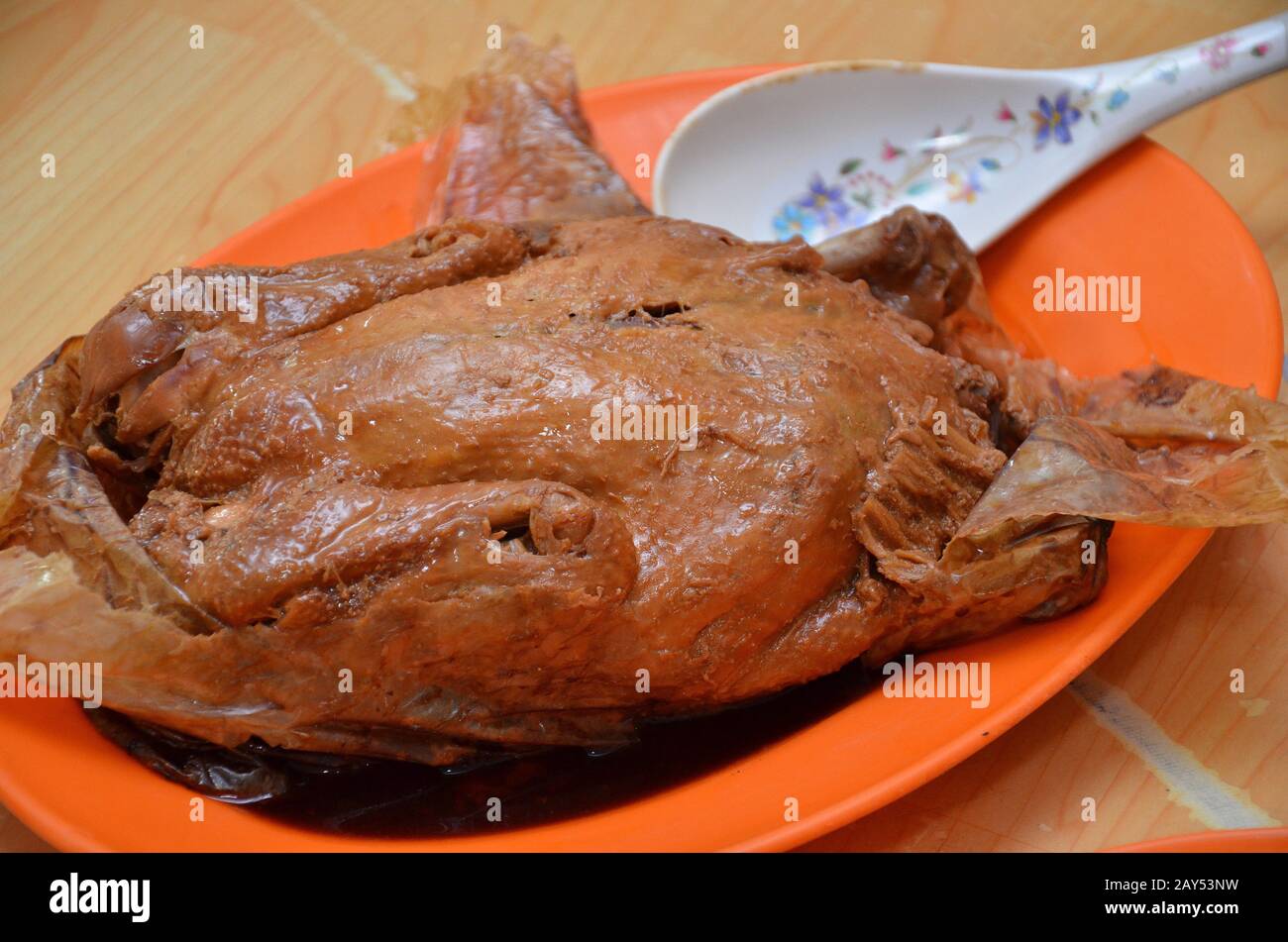 Beggar chicken served in restaurant Stock Photo - Alamy