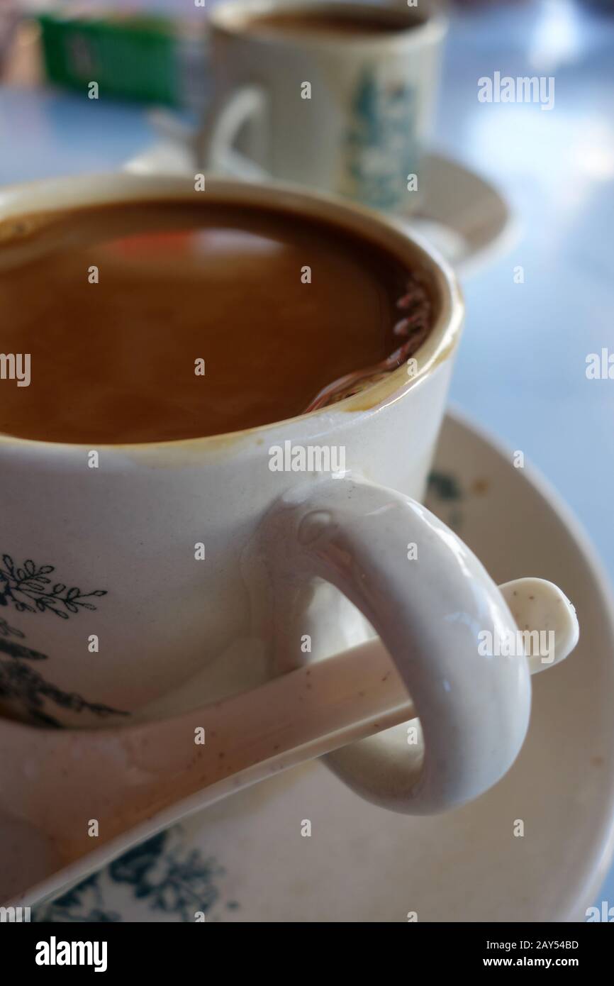 Traditional oriental Chinese coffee in vintage mug and saucer Stock ...