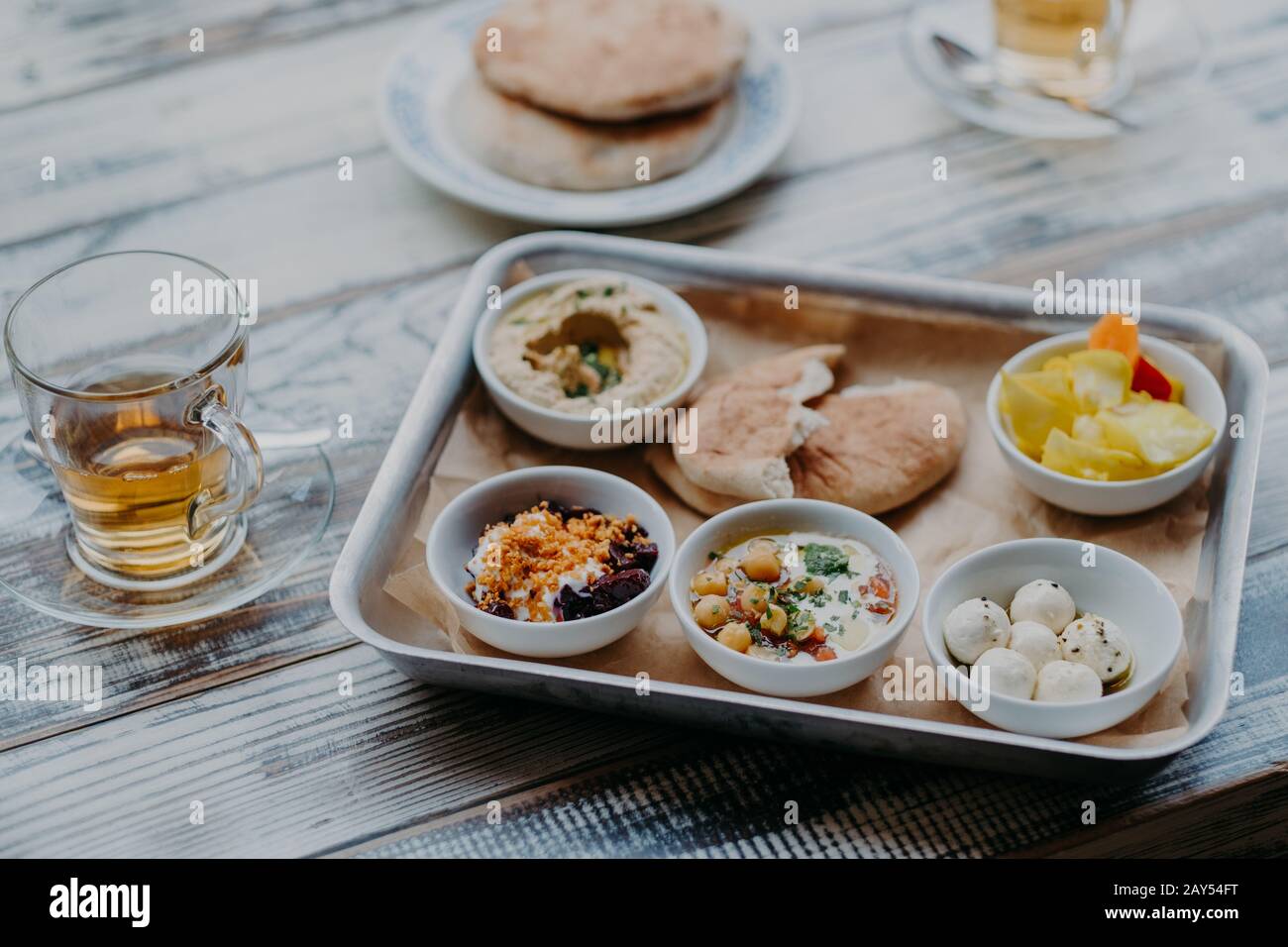 Overhead image of traditional Israel food on tray. Hummus, domestic ...