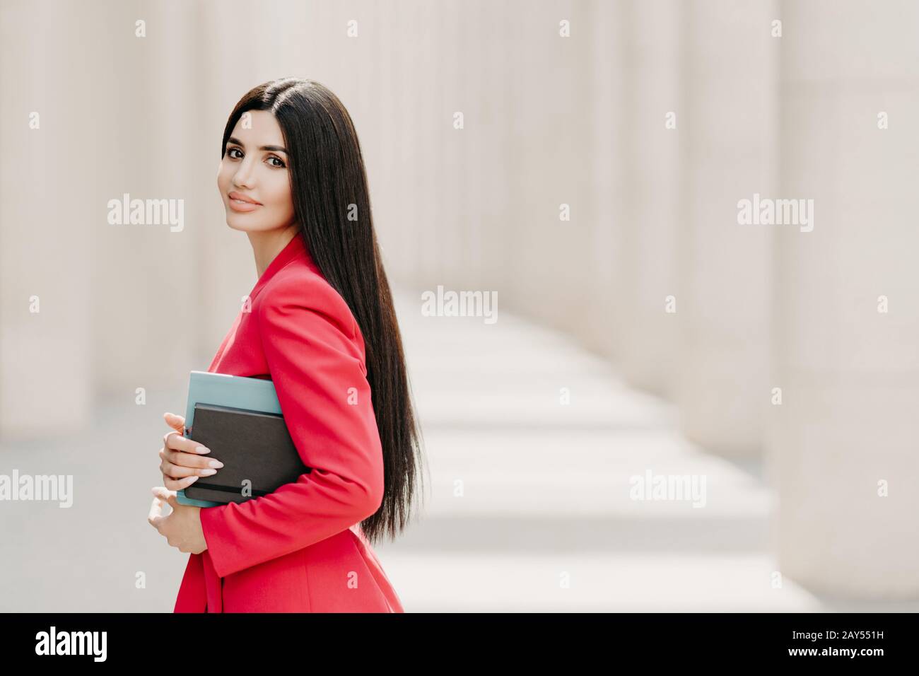 Slim girl stands sideways hi-res stock photography and images - Alamy
