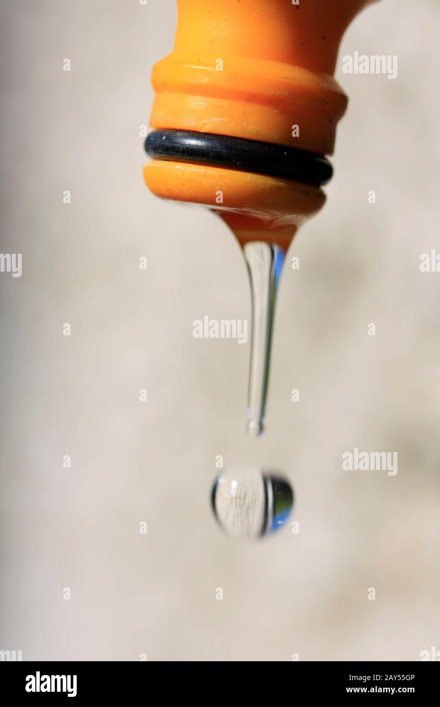 Water dripping from tap Stock Photo - Alamy
