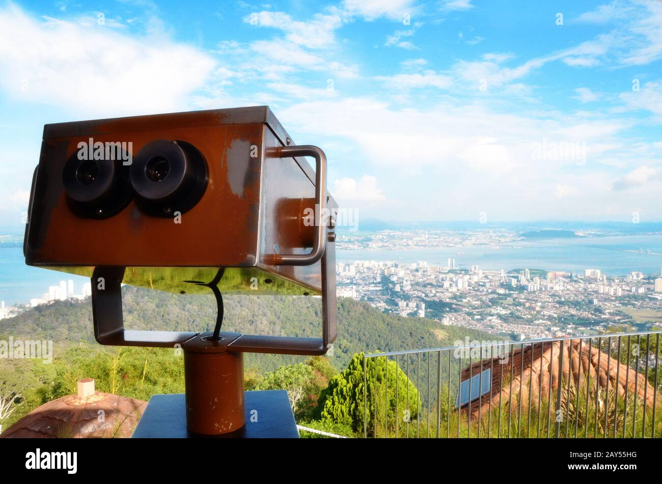 Colorful telescope viewer at Penang Hills Stock Photo - Alamy