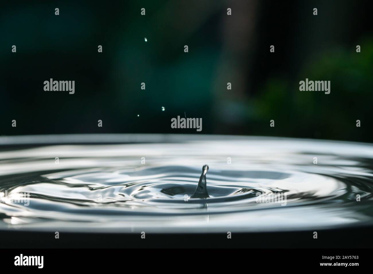 Water Drop splash with sun Stock Photo - Alamy