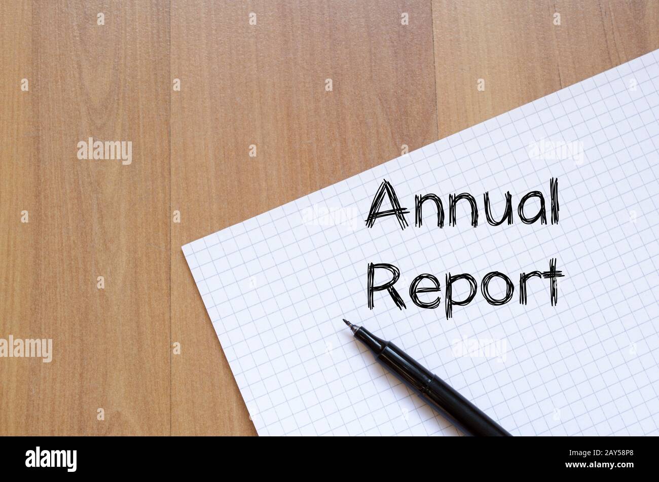 Annual report write on notebook Stock Photo - Alamy