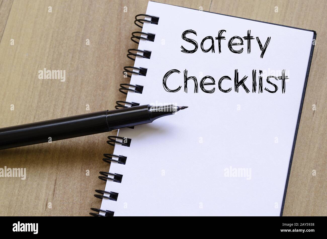 Safety checklist write on notebook Stock Photo - Alamy