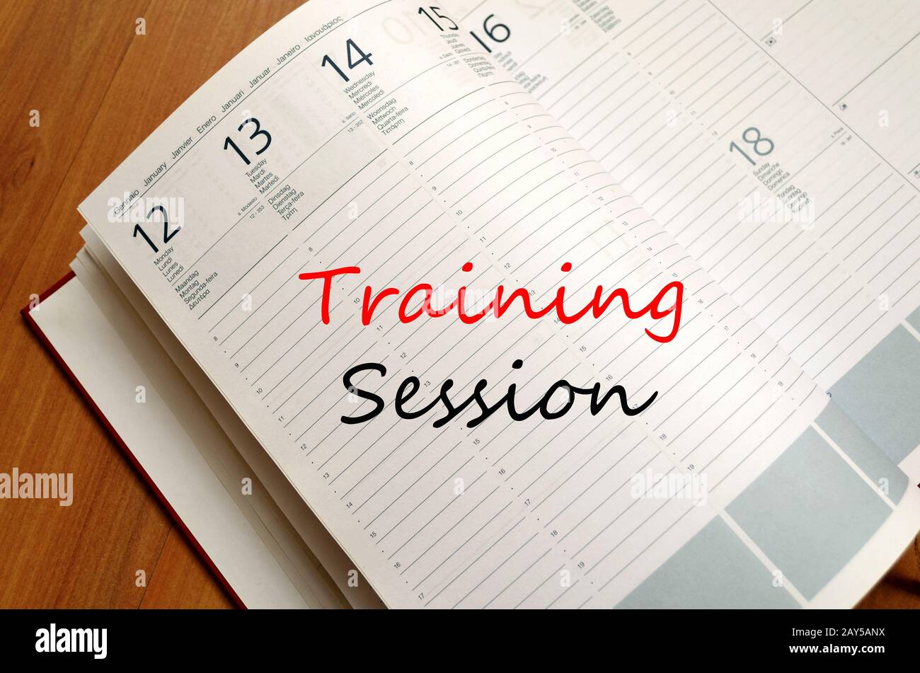 Training session write on notebook Stock Photo - Alamy