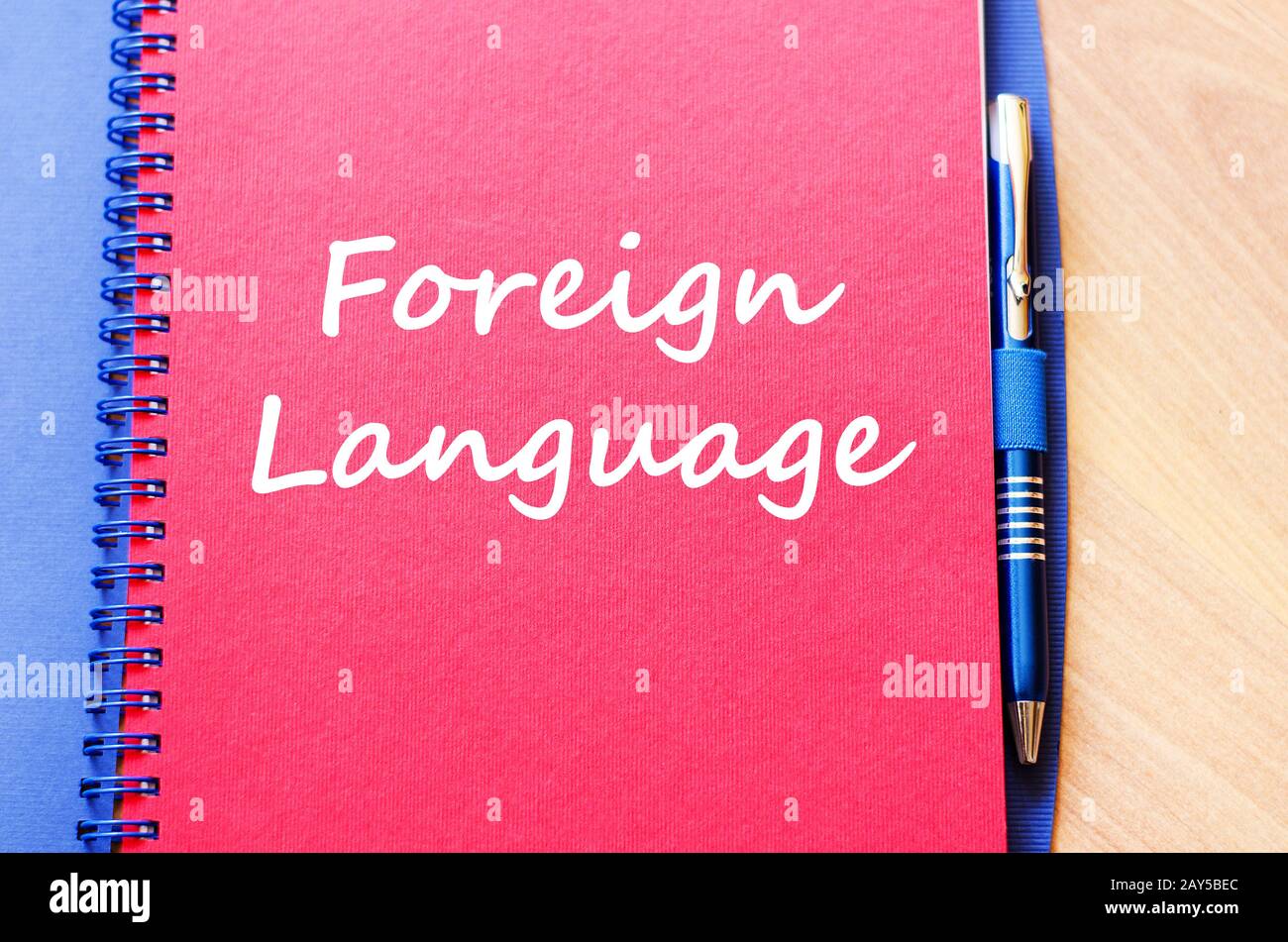 Foreign language write on notebook Stock Photo - Alamy