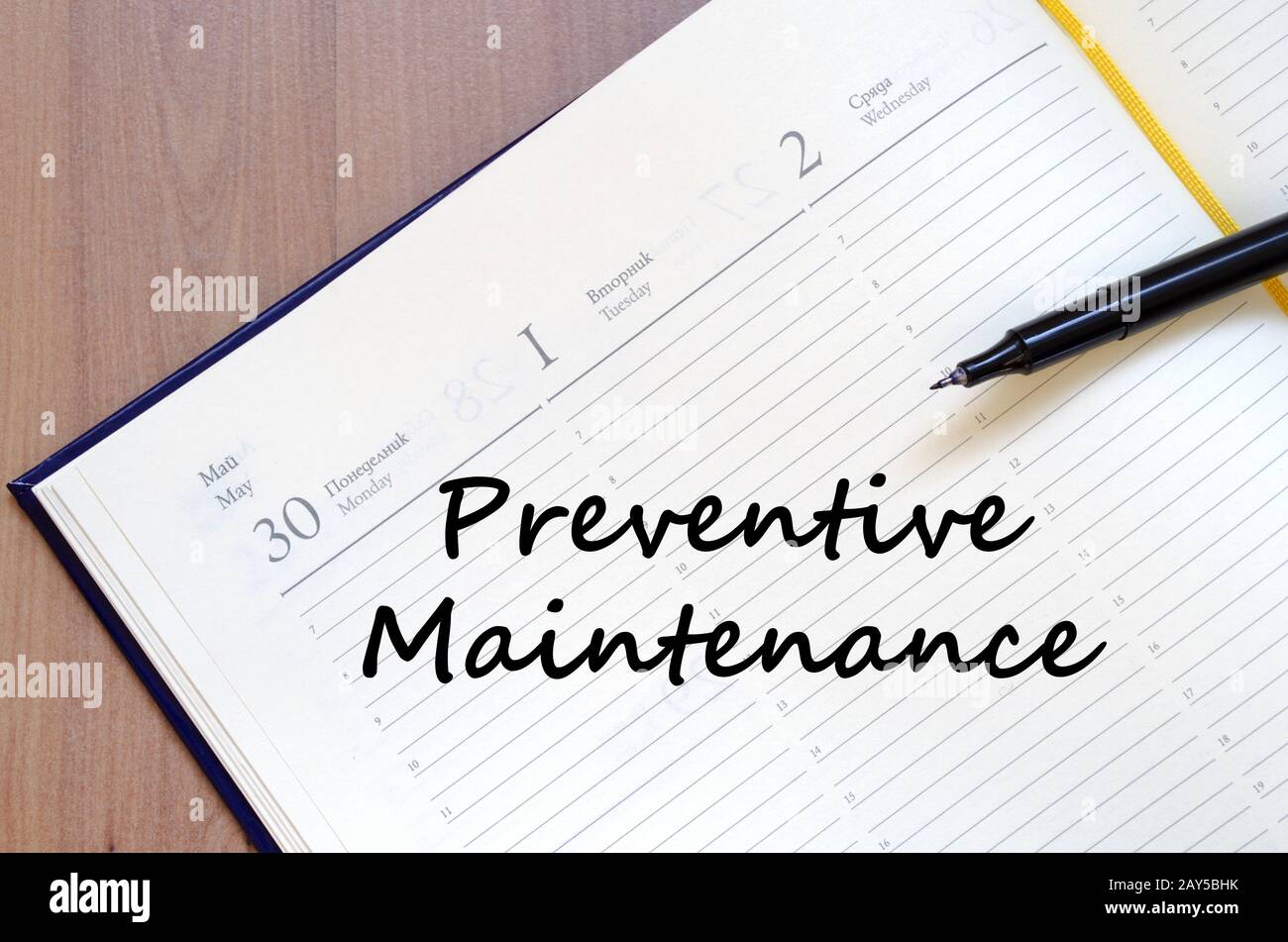 Preventive maintenance write on notebook Stock Photo - Alamy