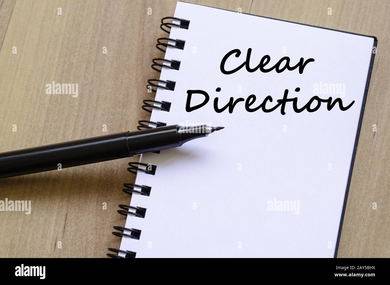 Clear direction write on notebook Stock Photo - Alamy