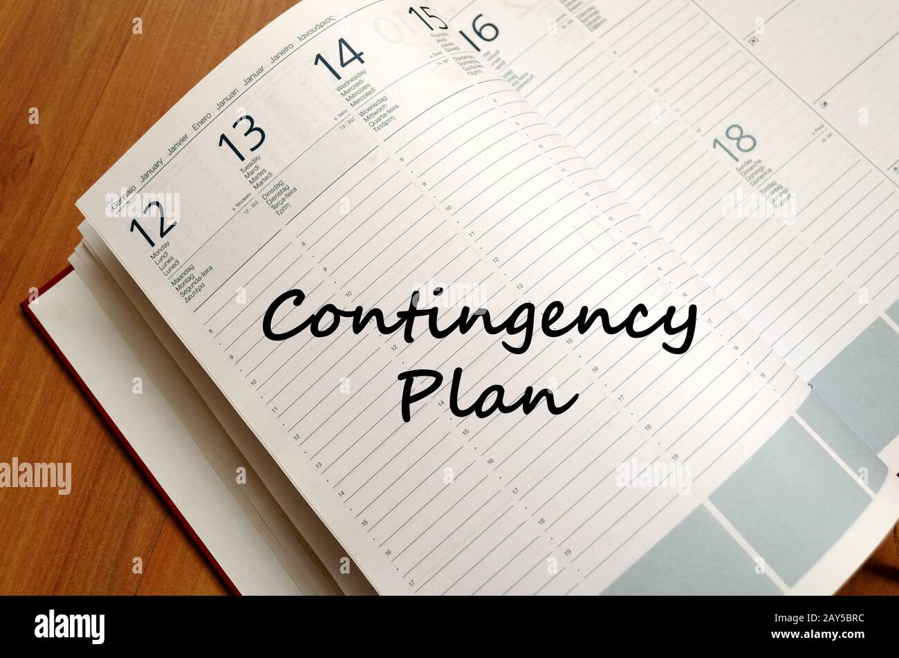 Contingency plan write on notebook Stock Photo - Alamy