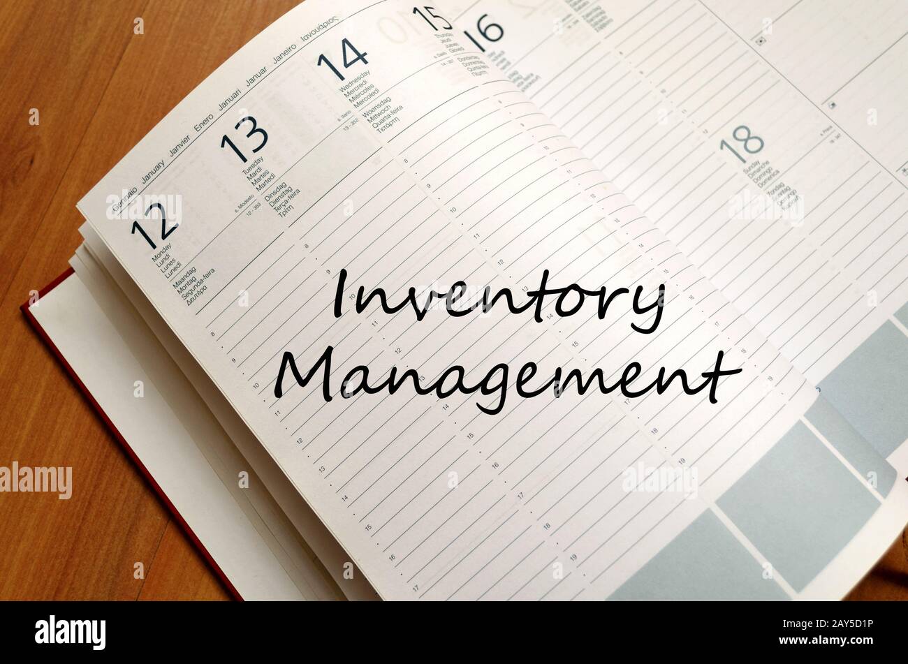 Inventory management write on notebook Stock Photo - Alamy