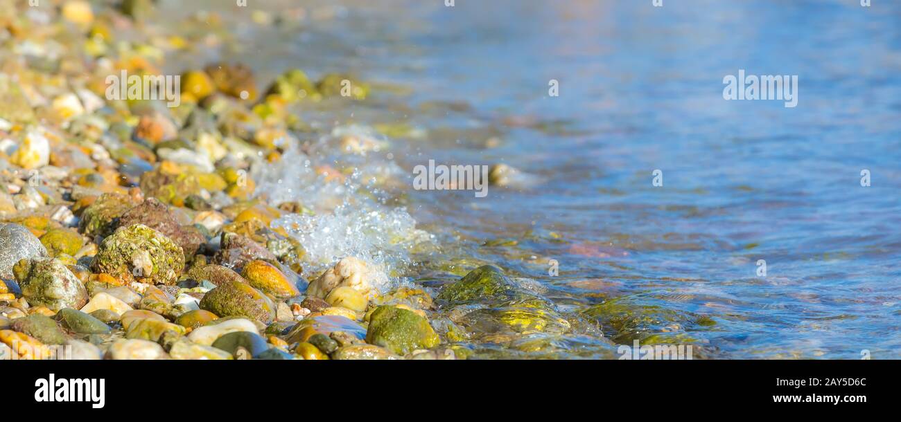 Sea stones banner background, ocean wave at the beach coast Stock Photo ...