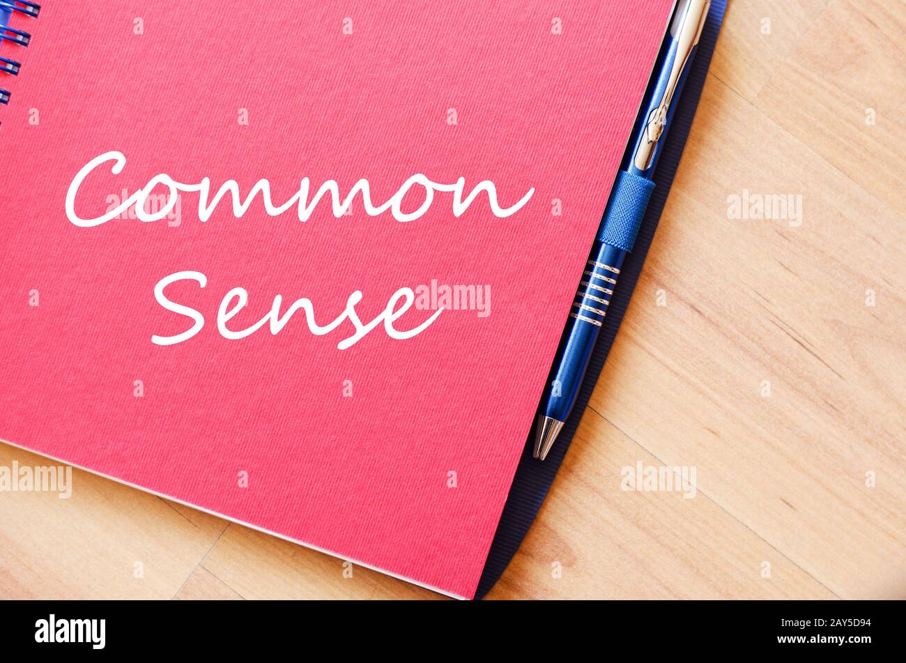 Common sense write on notebook Stock Photo - Alamy