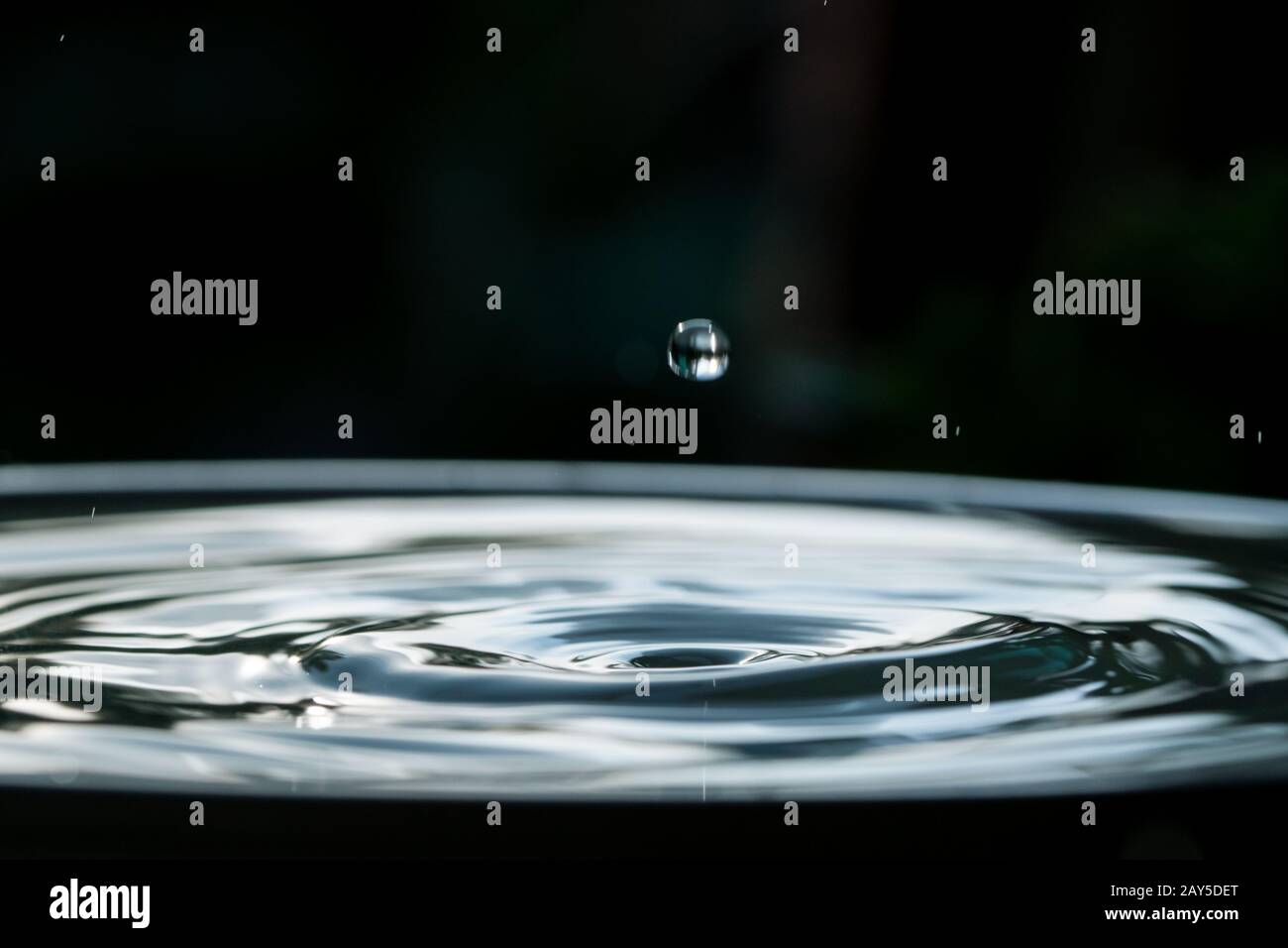 Water Drop splash with sun Stock Photo - Alamy