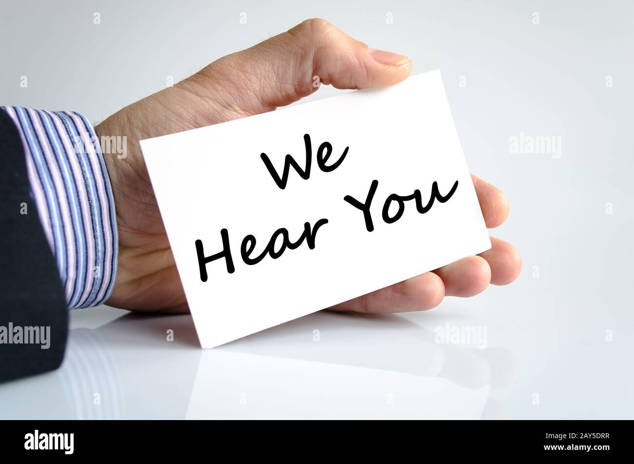 We hear you text concept Stock Photo - Alamy