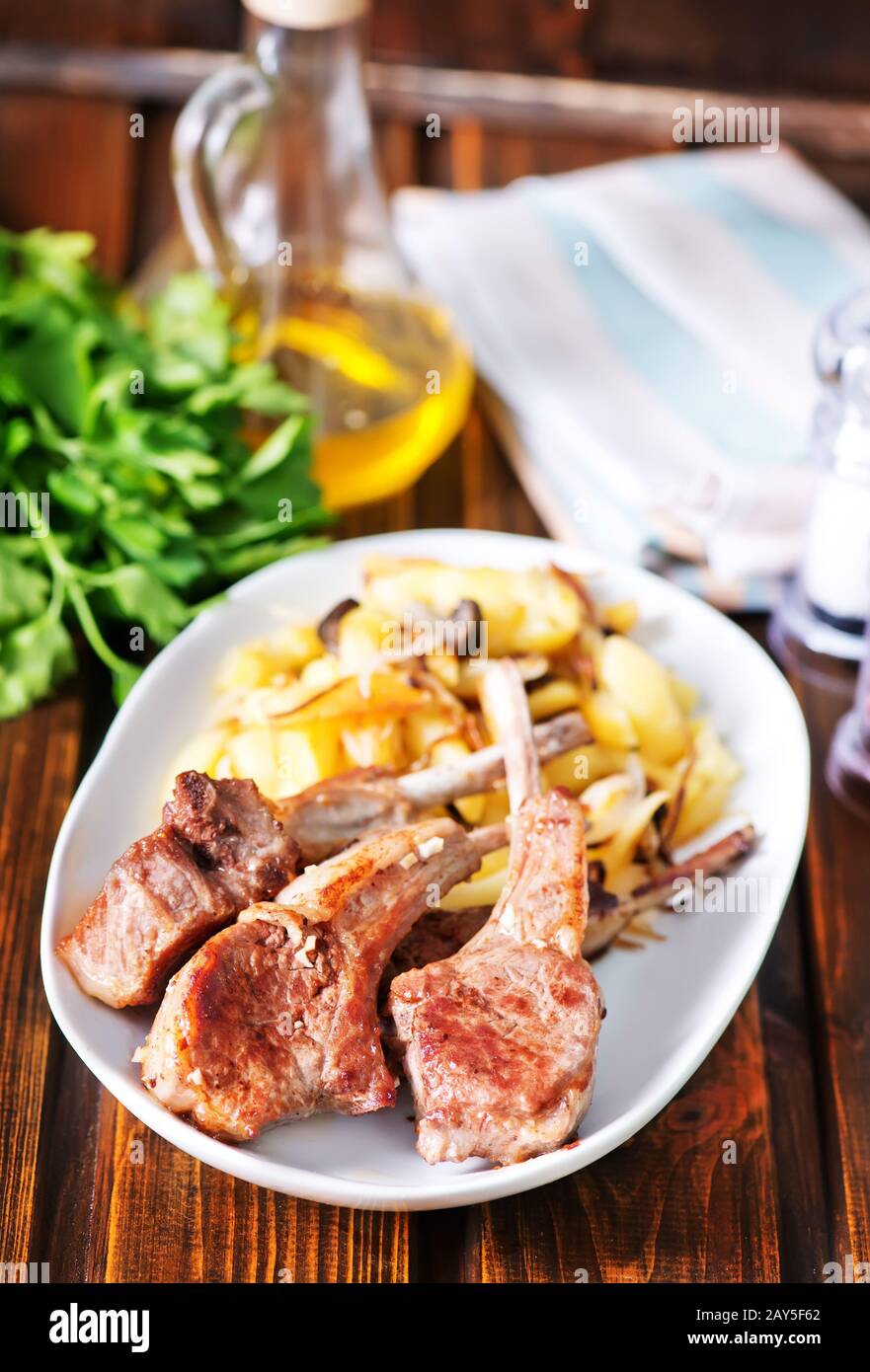 Rack of lamb fried with aromatic olive oil Stock Photo - Alamy