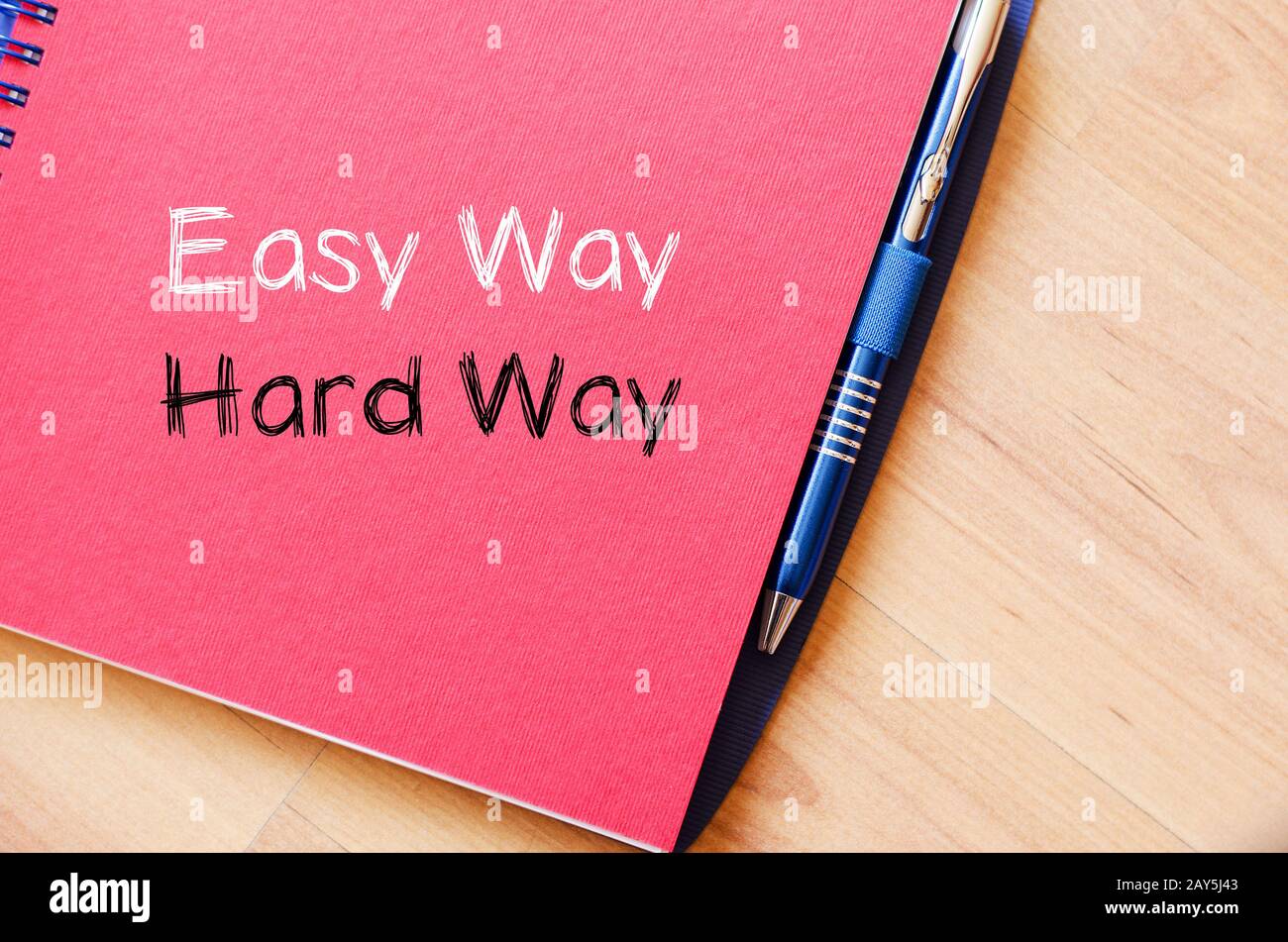 Easy hard difficult concept road sign hi-res stock photography and ...