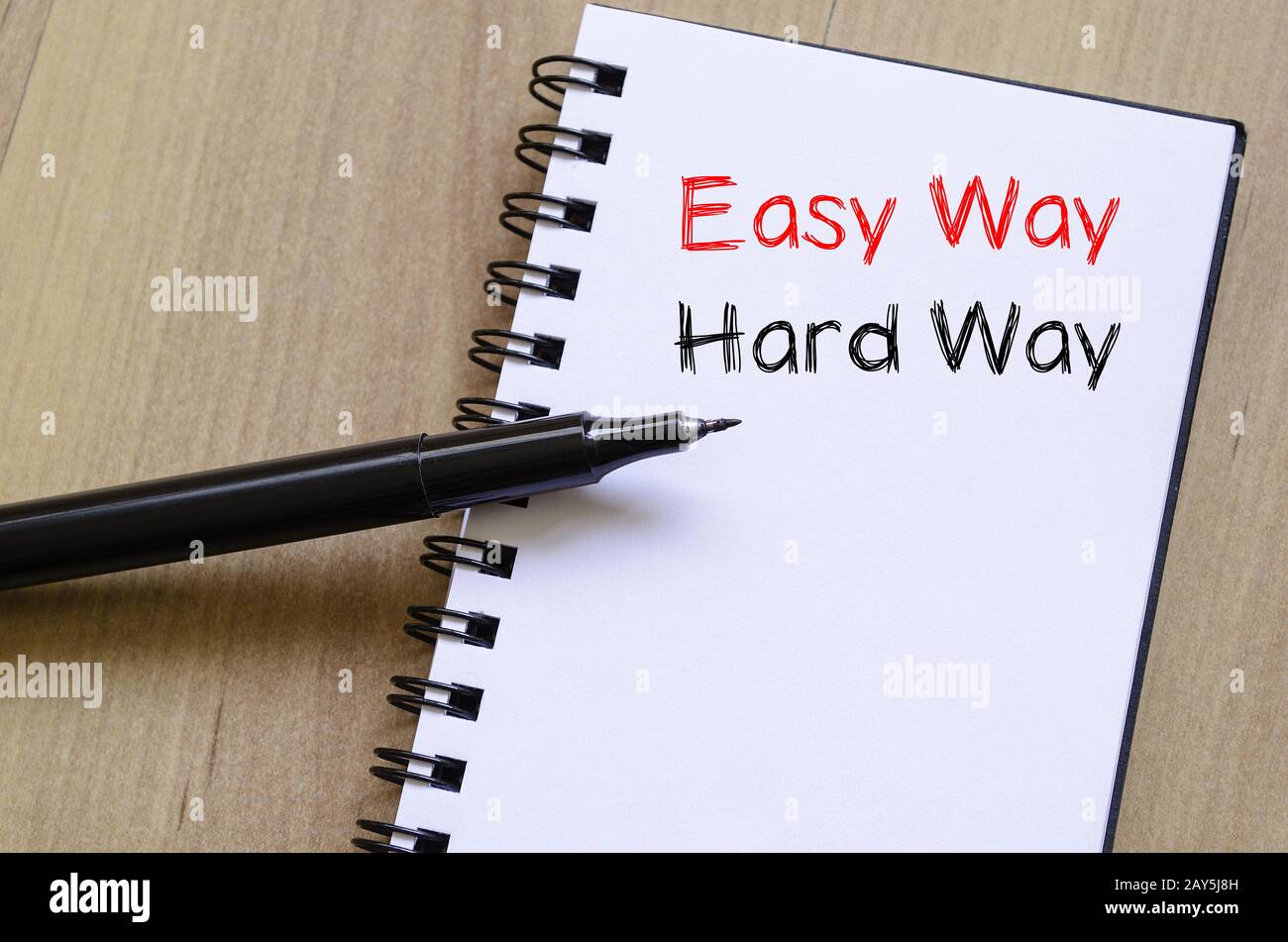 Easy hard difficult concept road sign hi-res stock photography and ...