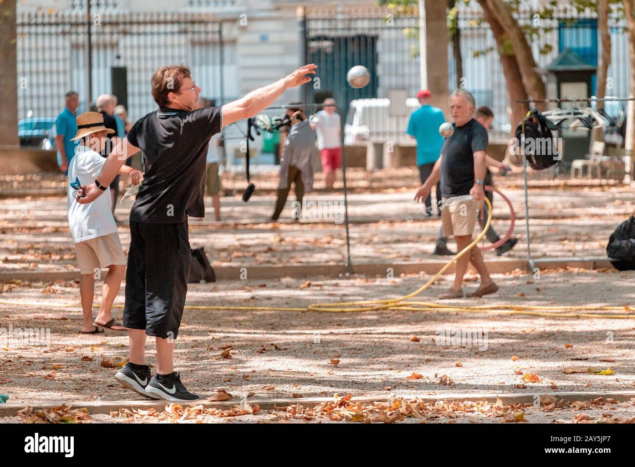 26 July 2019, Paris, France: Elderly men play a traditional French game ...