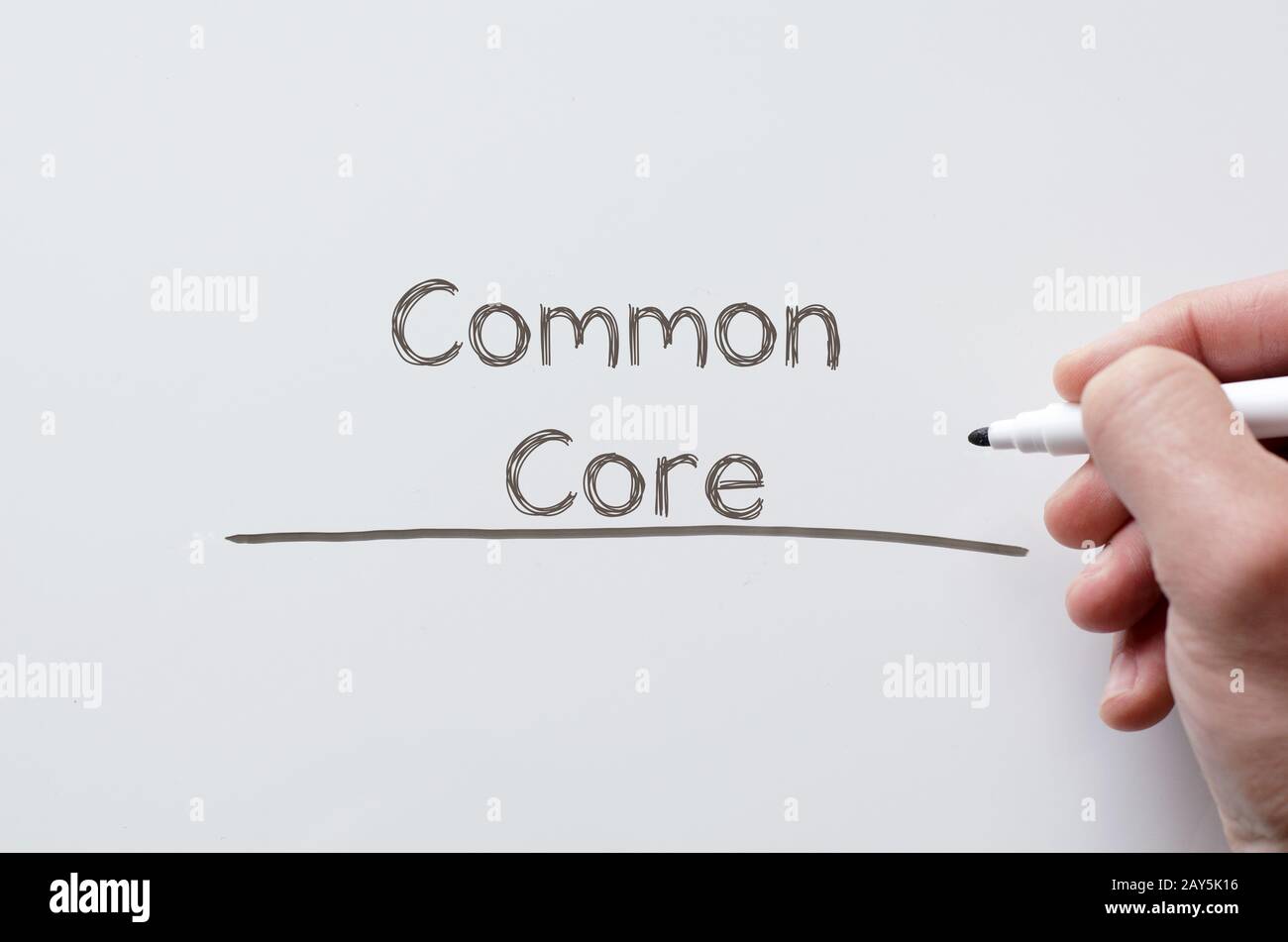 Common core written on whiteboard Stock Photo - Alamy