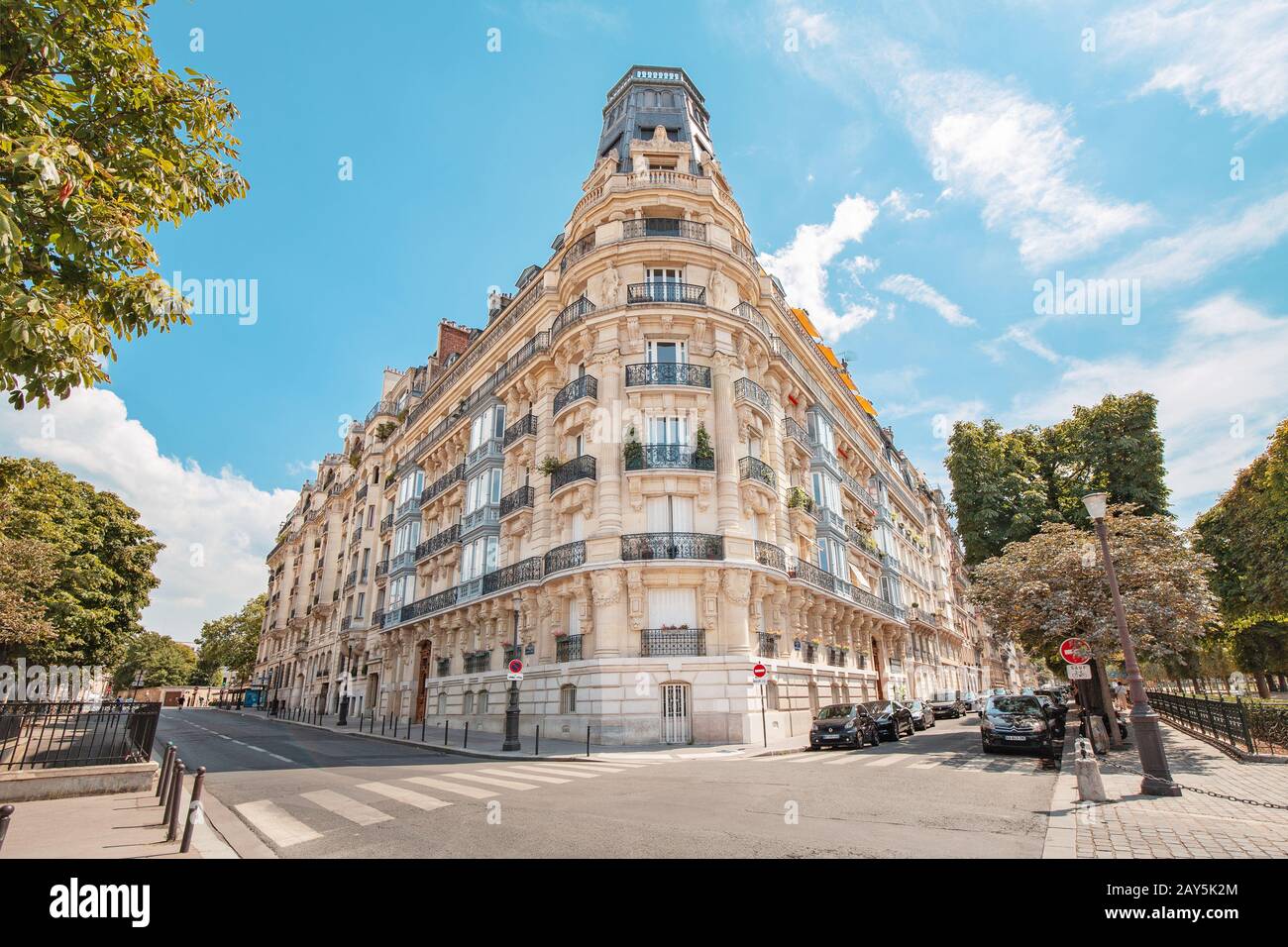 26 July 2019, Paris, France: Typical Parisian residential corner house ...