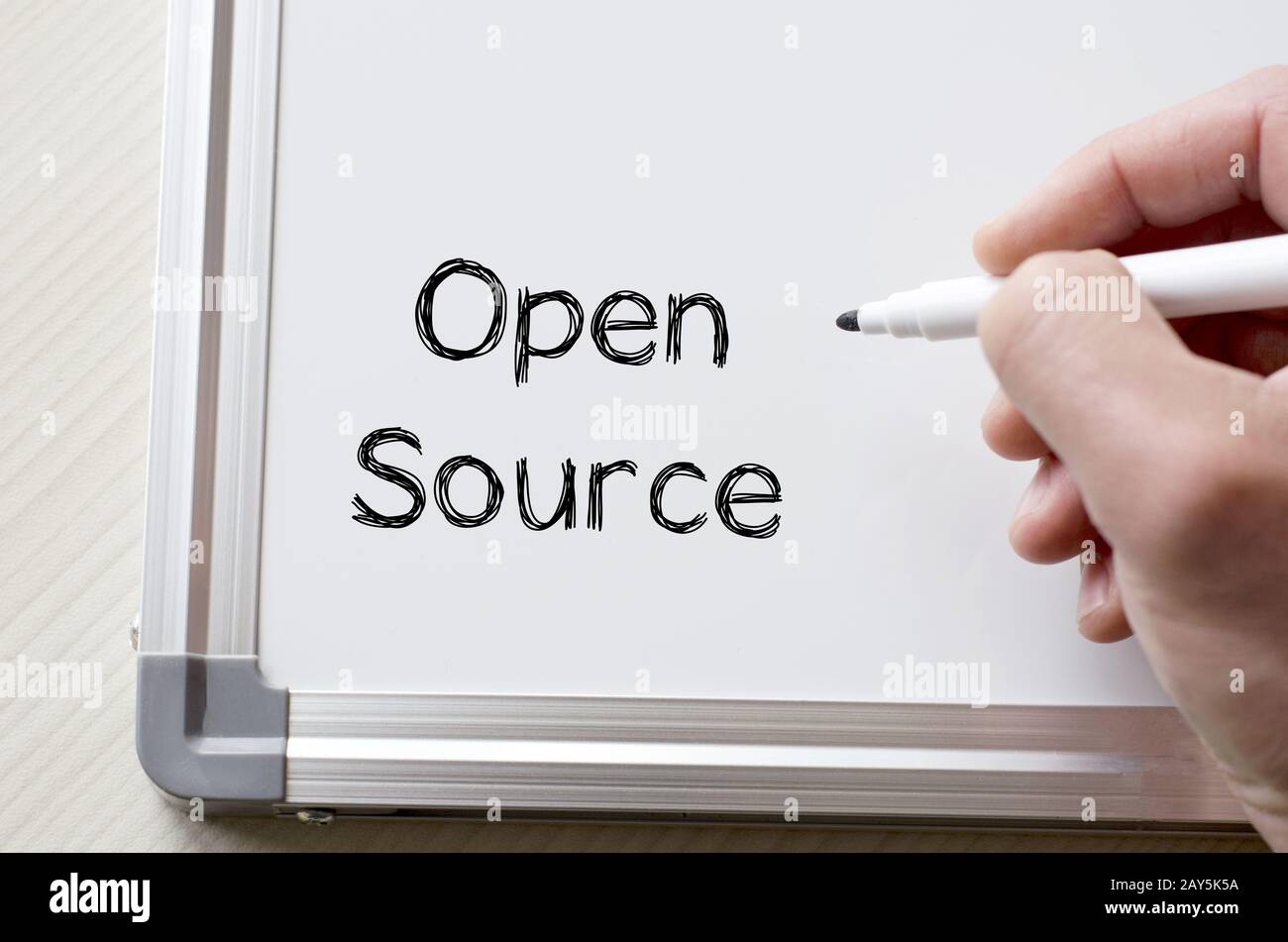 Open source written on whiteboard Stock Photo - Alamy