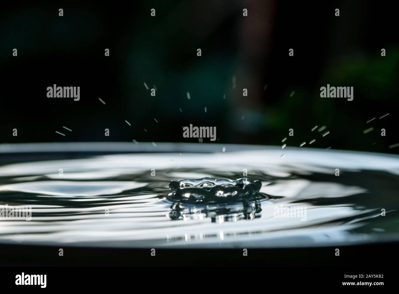Water Drop splash with sun Stock Photo - Alamy