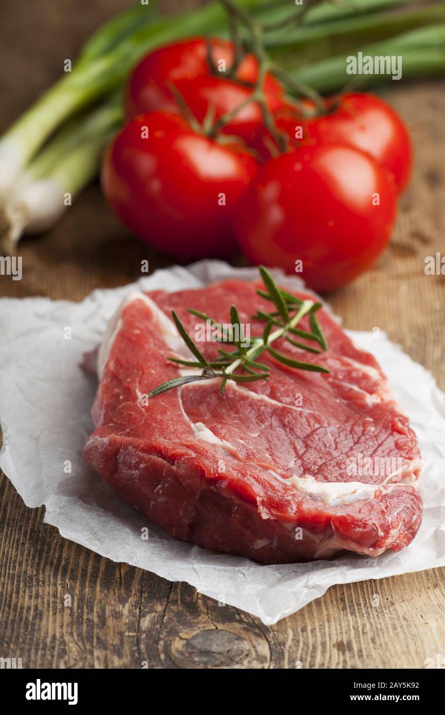 Raw juicy beef steak Stock Photo - Alamy