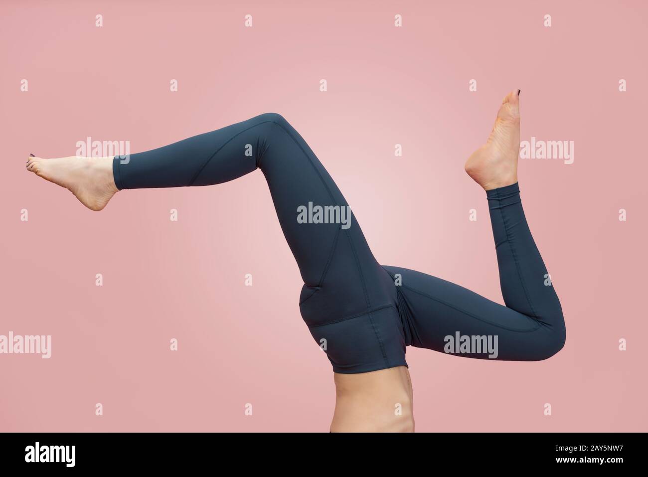 close up of a woman doing a handstand, legs Stock Photo - Alamy