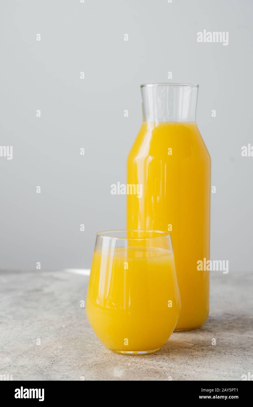Cold fresh orange juice filled in glassware, full of vitamins, isolated ...