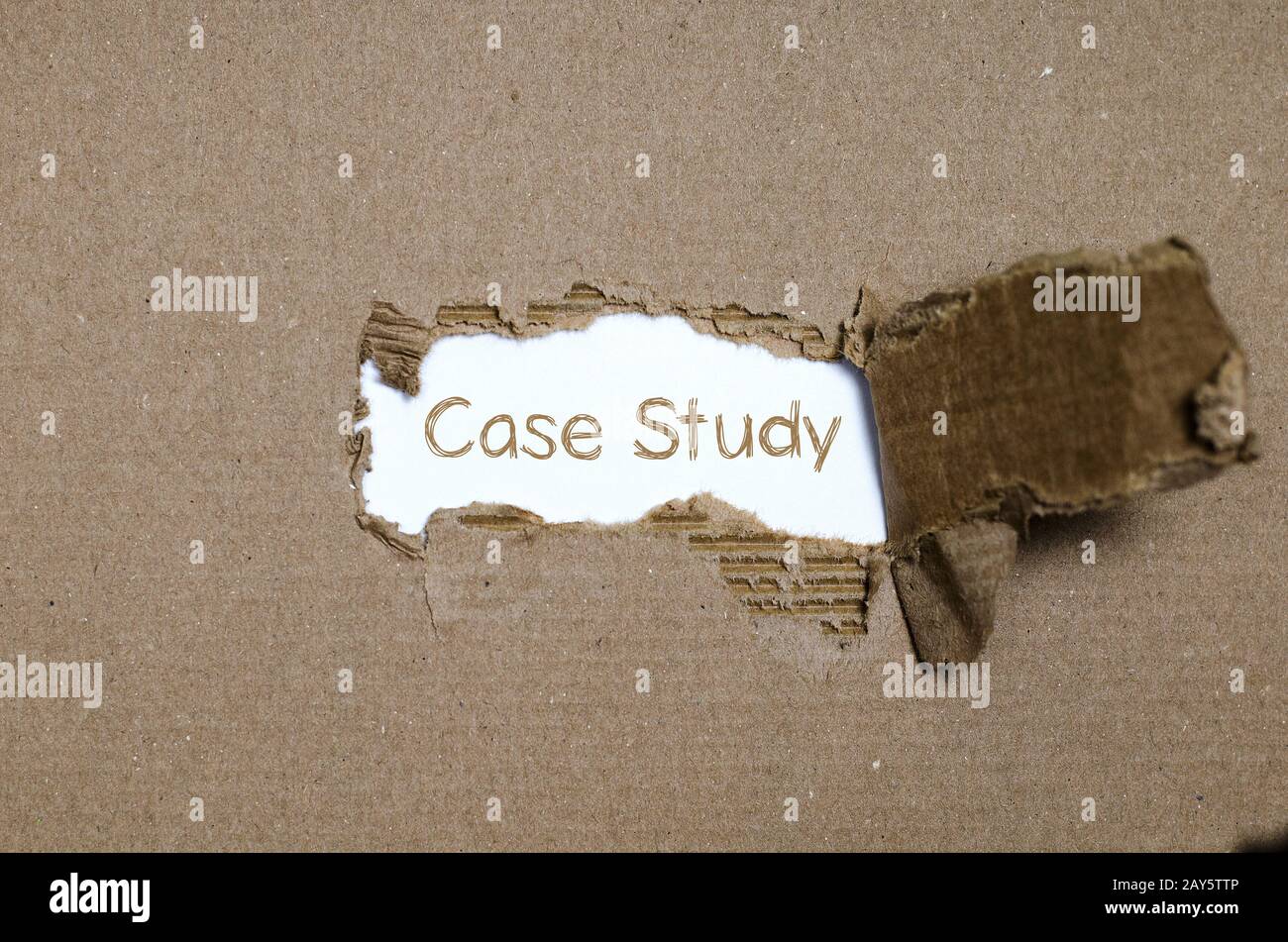 The word case study appearing behind torn paper Stock Photo - Alamy