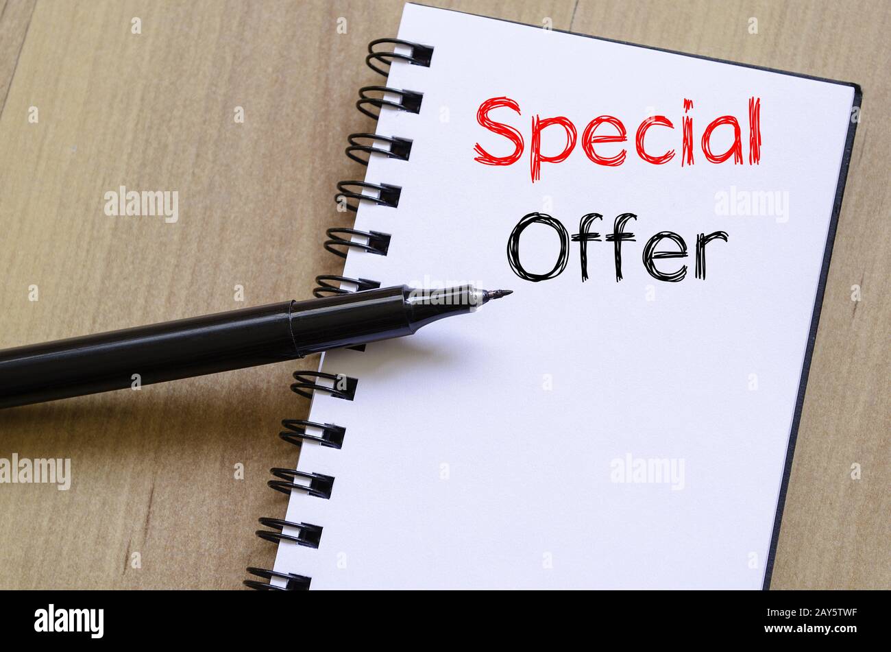 Special offer write on notebook Stock Photo - Alamy