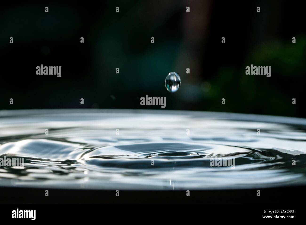 Water Drop splash with sun Stock Photo - Alamy