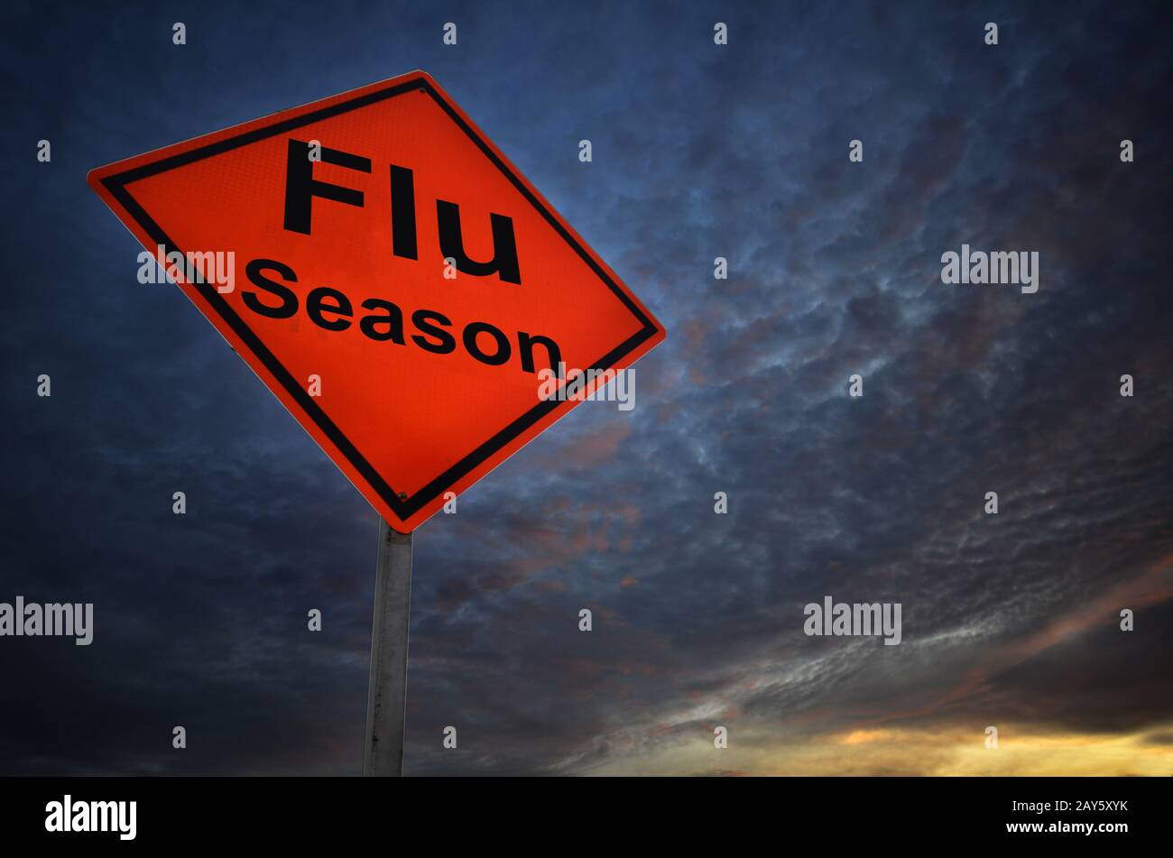 Flu season warning road sign Stock Photo - Alamy