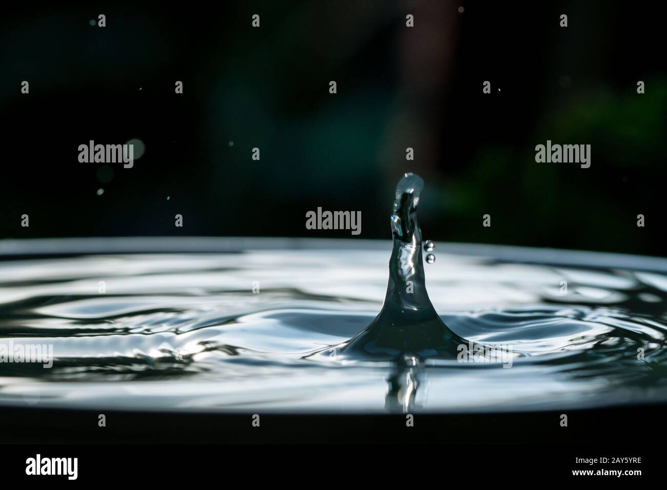 Water Drop splash with sun Stock Photo - Alamy