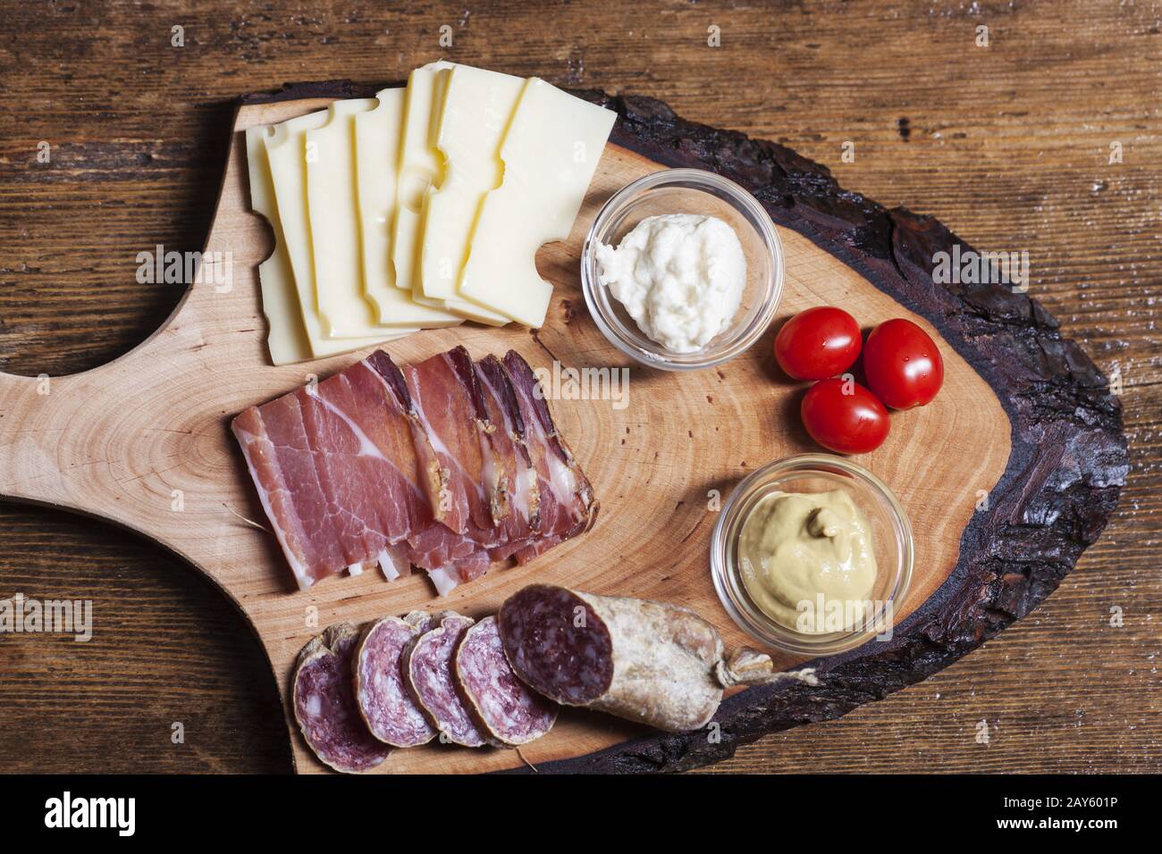 South Tyrolean specialities on wood Stock Photo - Alamy