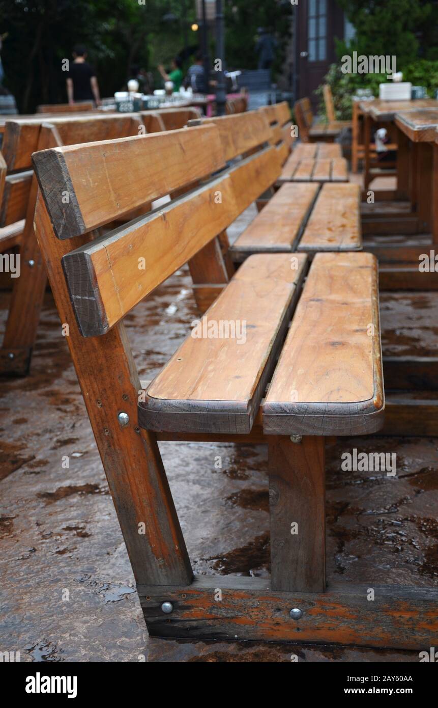 Long bench in outdoor Stock Photo - Alamy