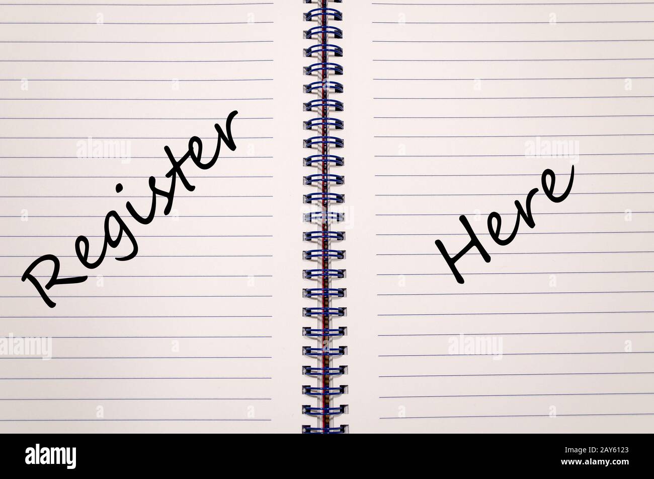 Register here write on notebook Stock Photo - Alamy