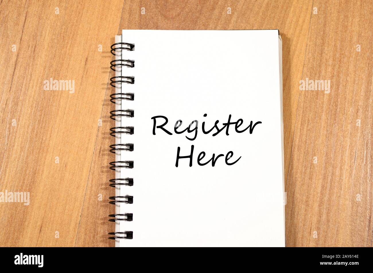 Register here write on notebook Stock Photo - Alamy